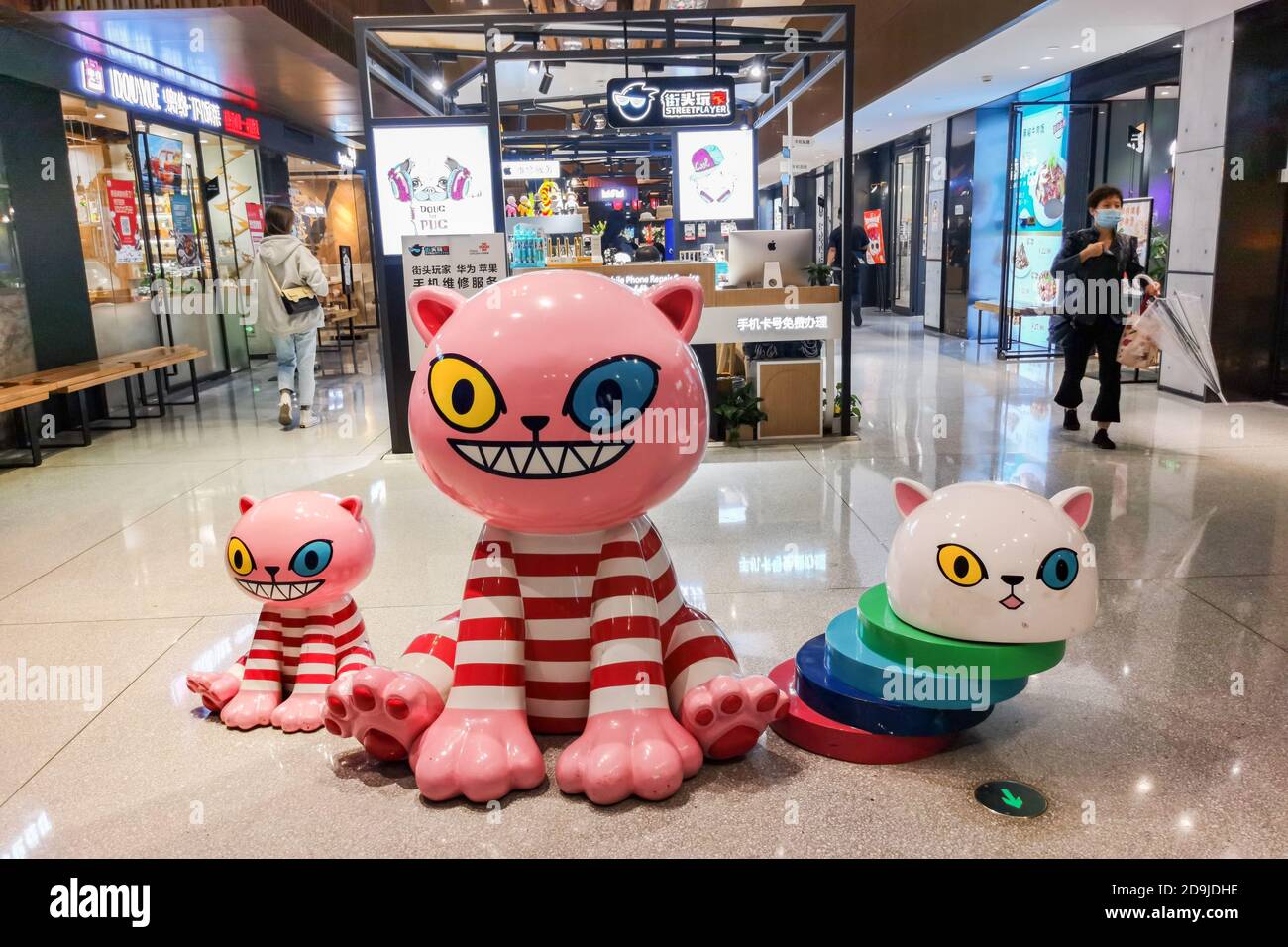 A giant Kuncat model is set up by the gate of a shopping mall to ...