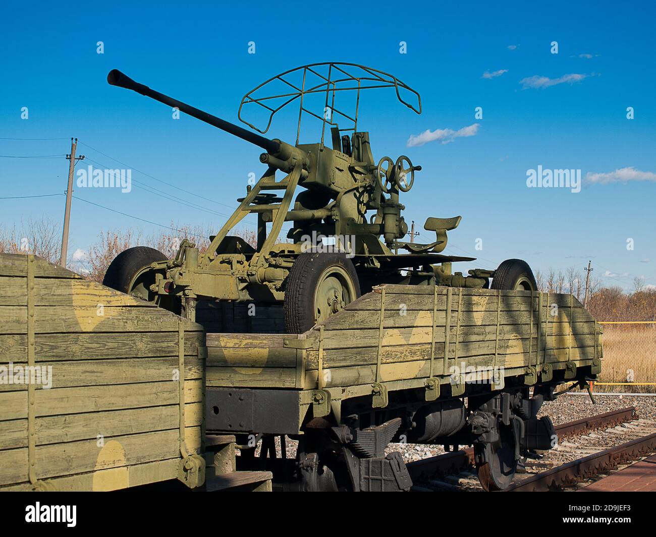 Anti-aircraft gun on the back platform of the armored train Stock Photo ...