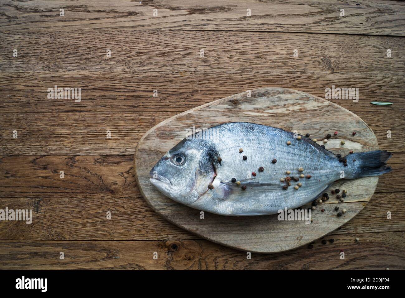 Cooking background, fish on the blackboard, top view Stock Photo - Alamy