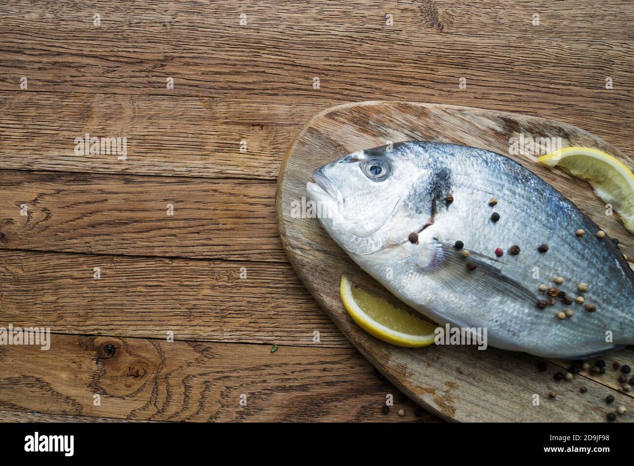 Cooking background, fish on the blackboard, top view Stock Photo - Alamy