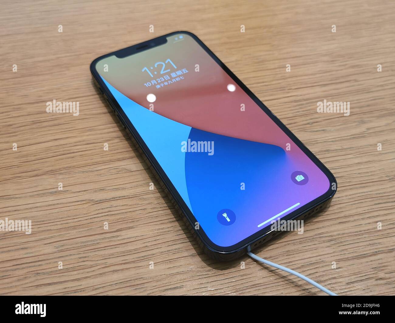 An iPhone of the new 12 series is on display at a flagship in Shanghai ...