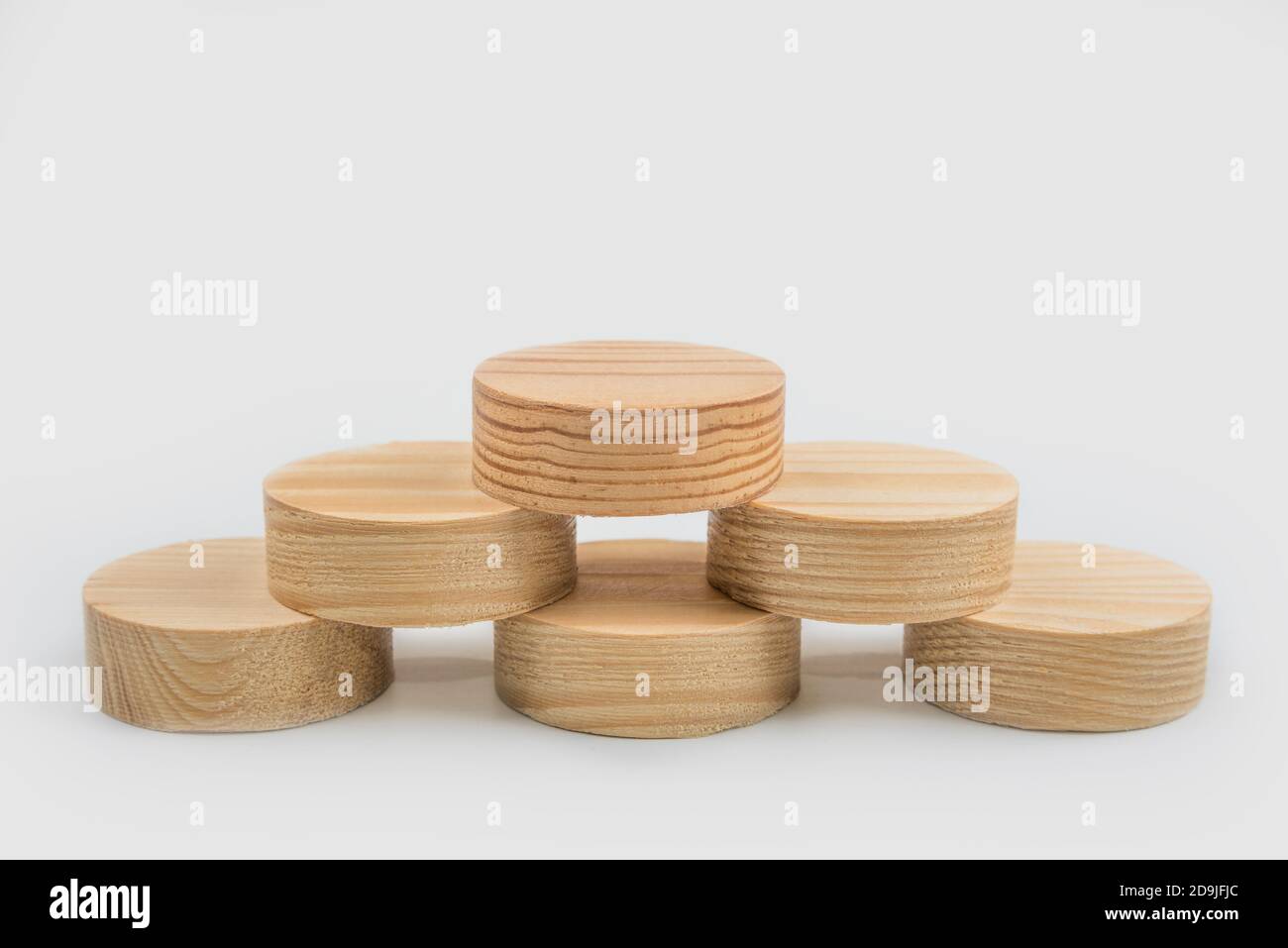 Pile of circle Wooden cutouts for conceptual sign Stock Photo - Alamy