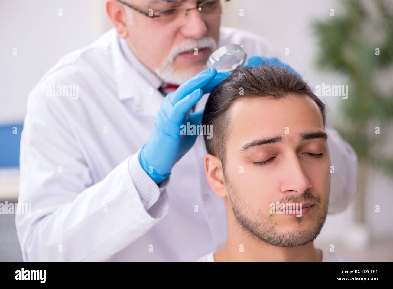 Dermatologist removing hair patient hi-res stock photography and images ...