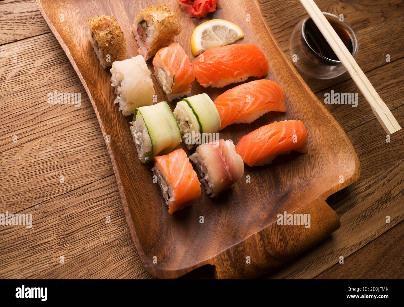 Set of sushi and maki roll on stone table. Top view with copy space ...