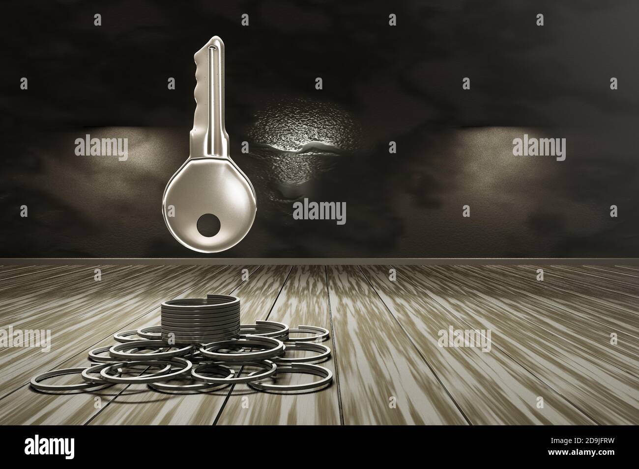 A metal key in the shape of rocket rising up into the sky on wooden ...