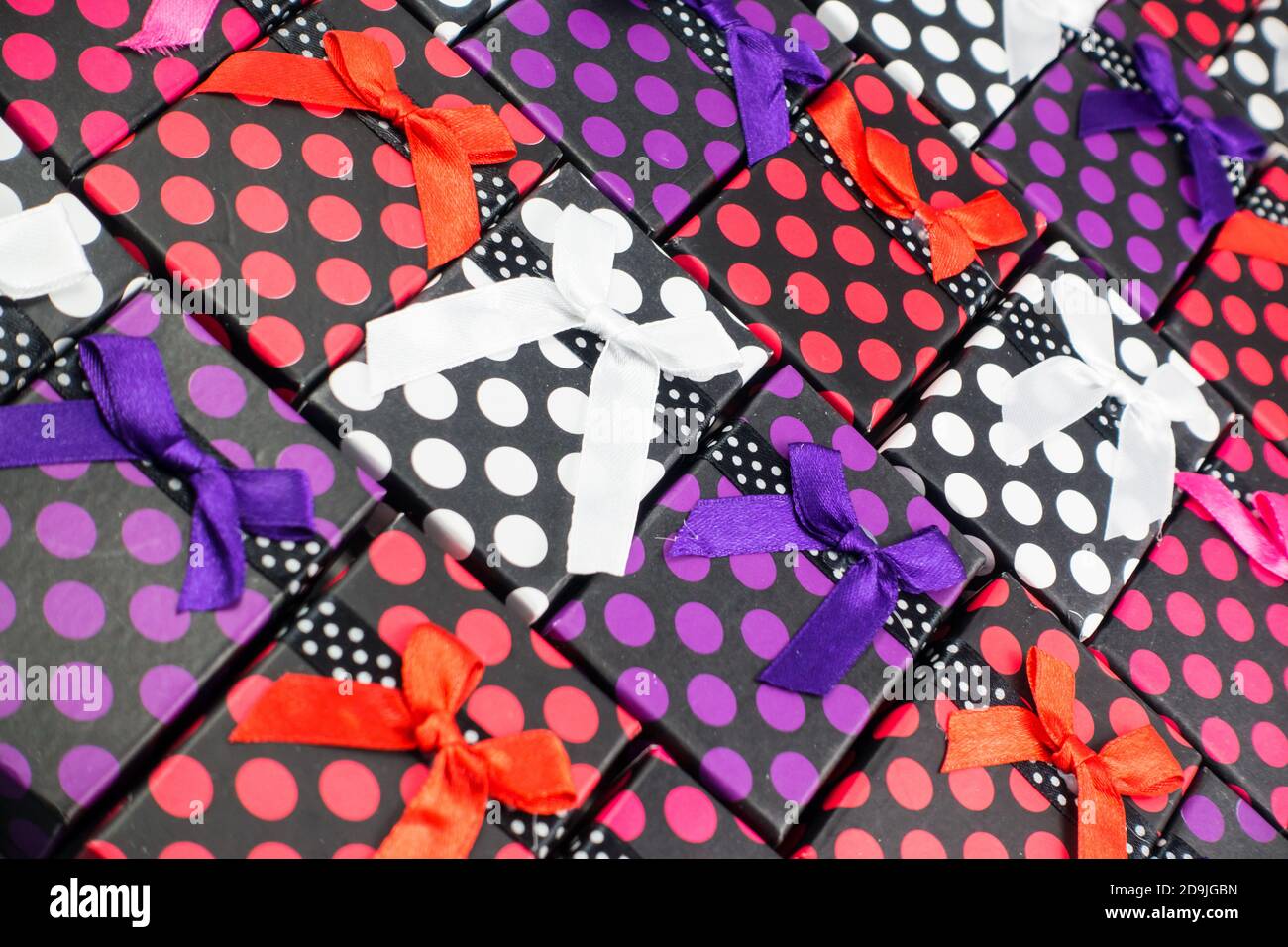 Closeup shot of colorful spotted gift boxes Stock Photo - Alamy