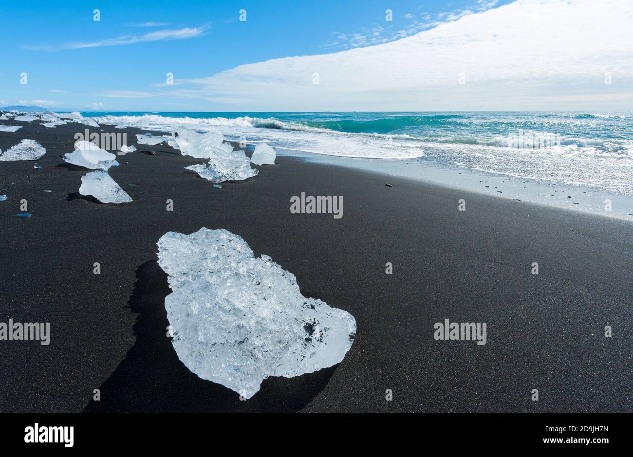 Beautiful beach in the South of Iceland with a black lava sand is full ...