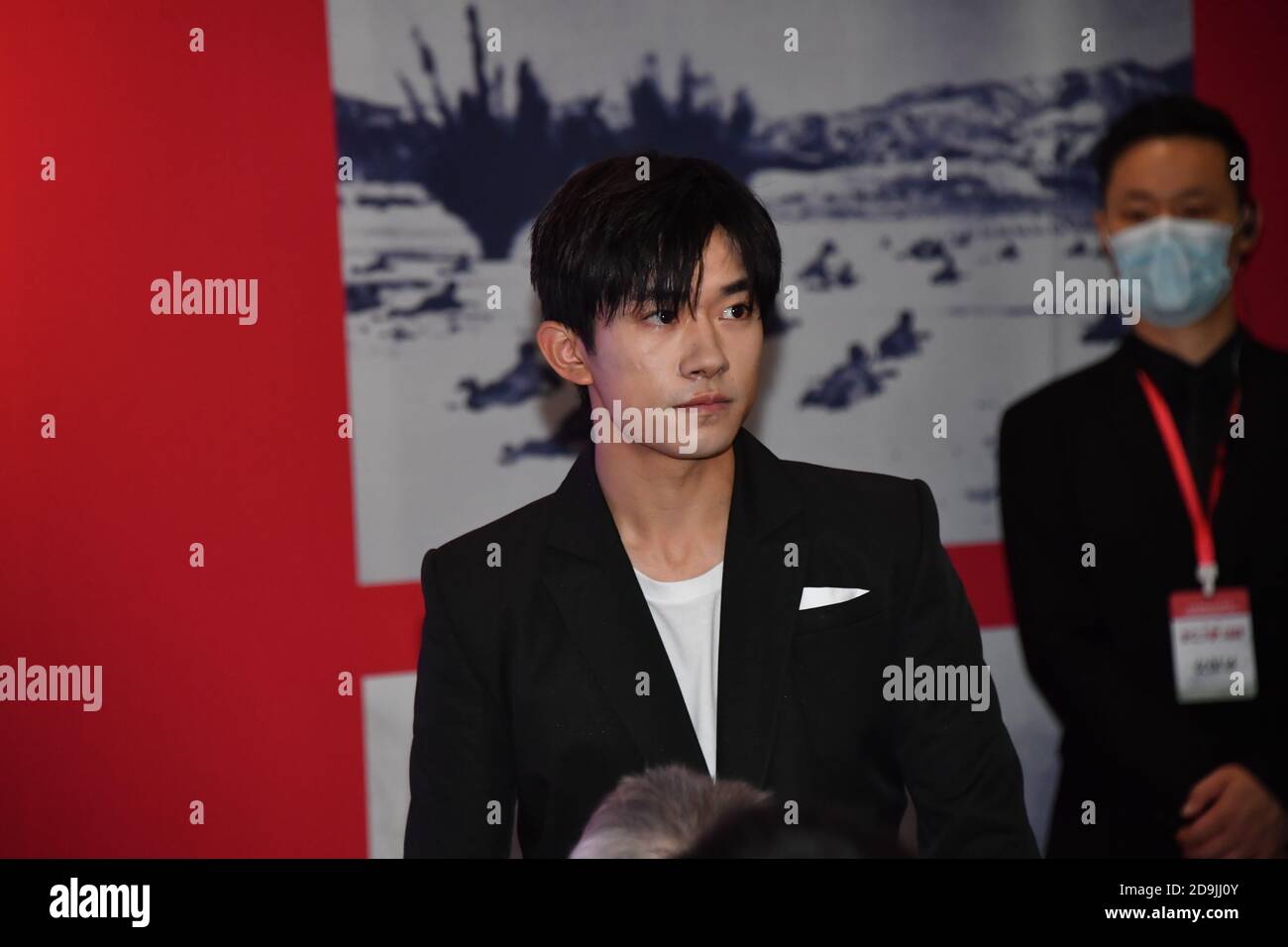Chinese singer, dancer and actor Jackson Yee, attends a press ...