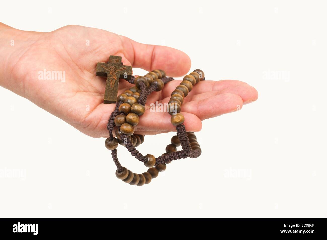 Hand holding rosary hi-res stock photography and images - Alamy