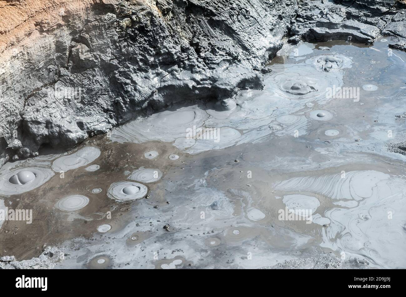 Hot boiling mud at fumarole is bubbling and exploding at mudpots ...