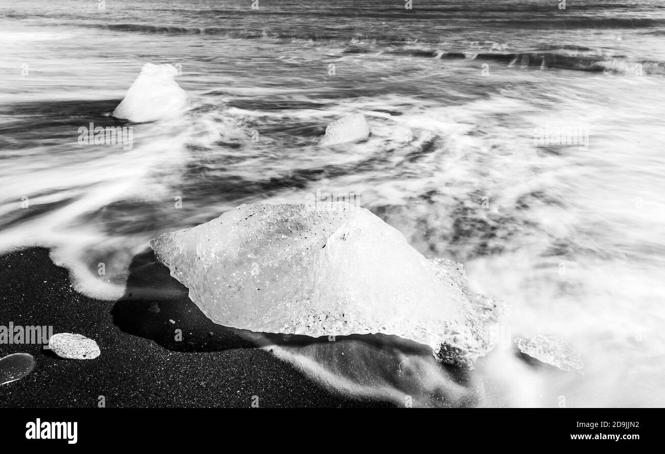 Beautiful beach in the South of Iceland with a black lava sand is full ...