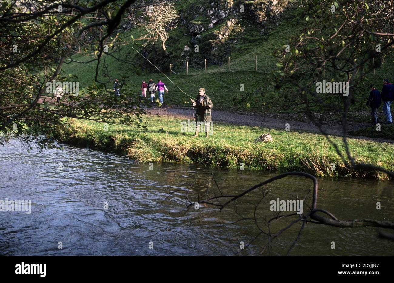 Fisherman in Dovedale by Thorpe Cloud Derbyshire Stock Photo - Alamy