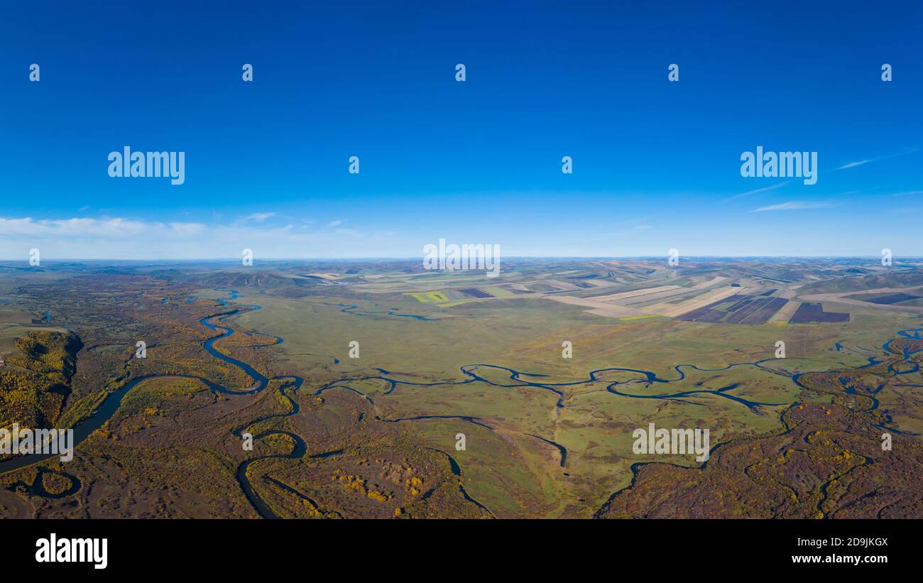 Aerial view of the beautiful autumn scenery in national wetland park in ...