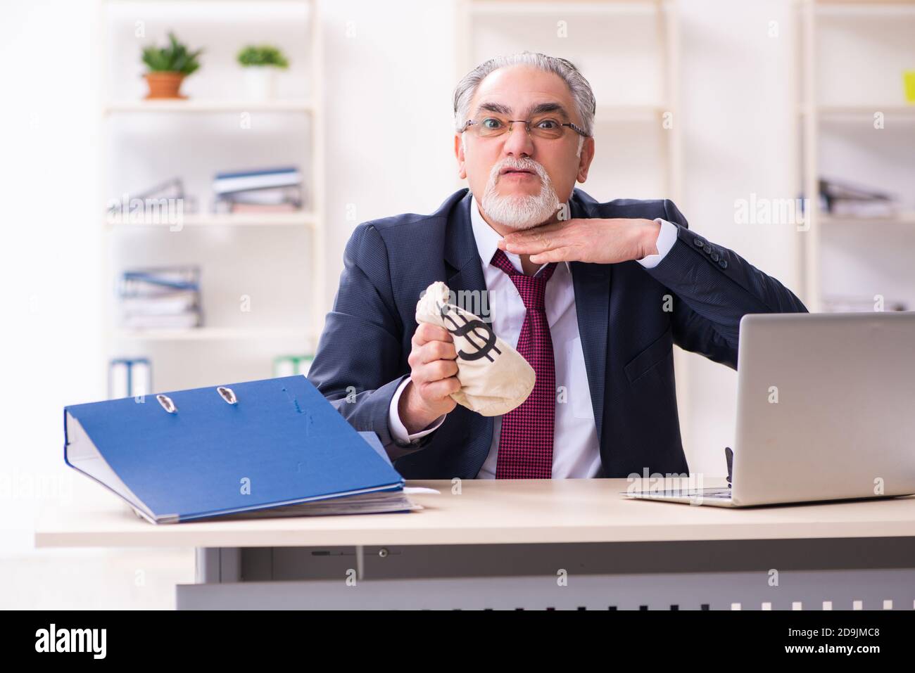Old businessman in bankruptcy concept Stock Photo - Alamy
