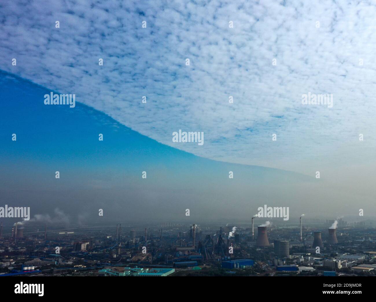 A cloud boundary line of "half blue sky and half white clouds" appears ...