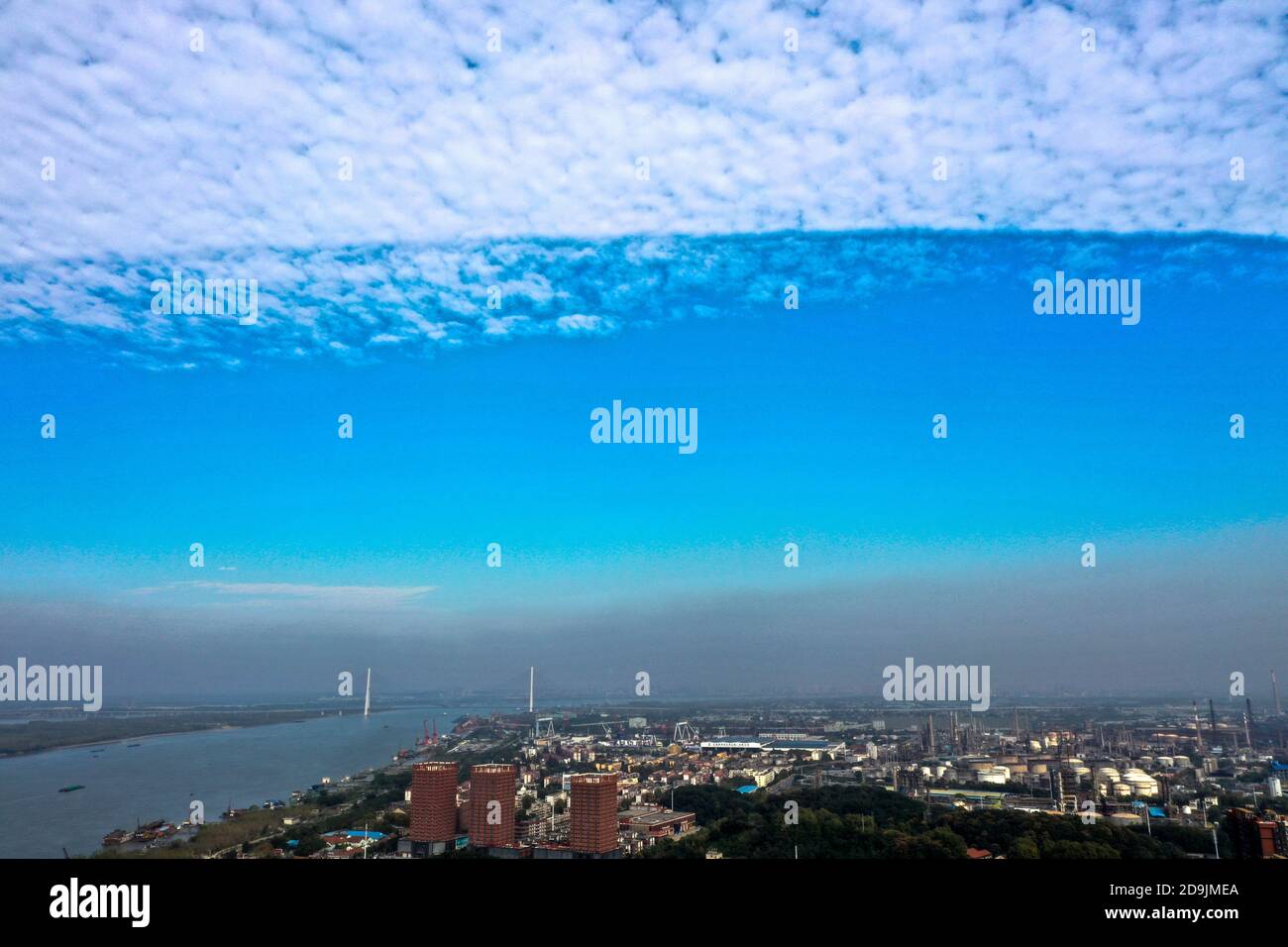 A cloud boundary line of "half blue sky and half white clouds" appears ...