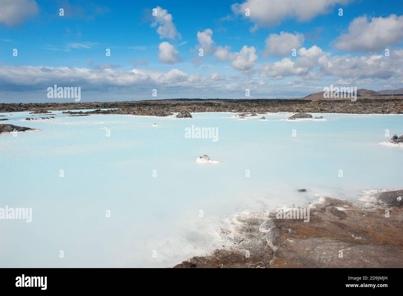 Blue water of the famous Icelandic Blue Lagoon spa is produced by near ...