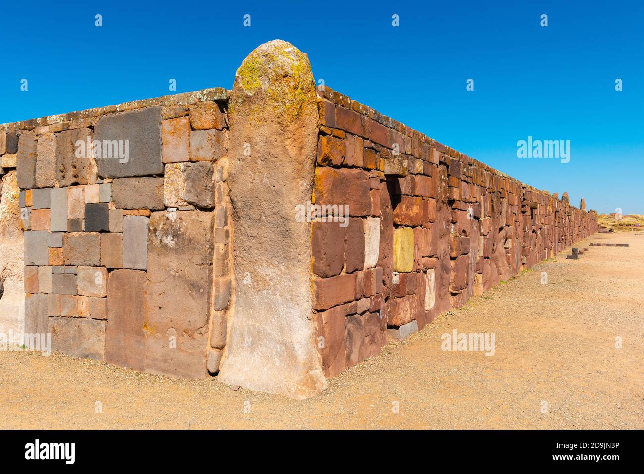 Stone wall surrounding Kalasaya Temple, archeological site Tiwanaku or ...