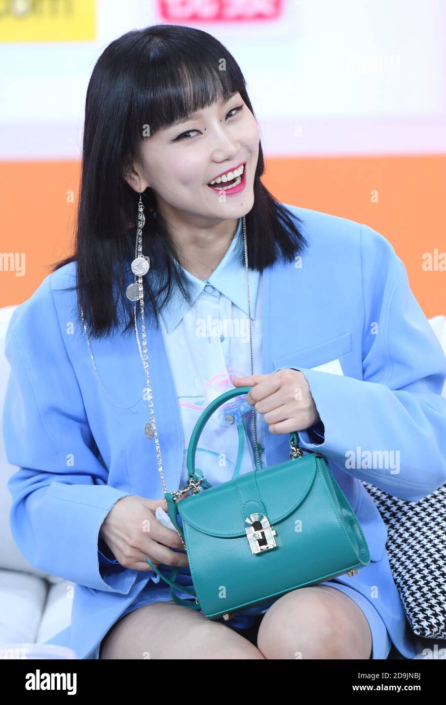 Chinese singer Huang Ling or Isabelle Huang, attends an activity in Beijing, China, 27 October ...