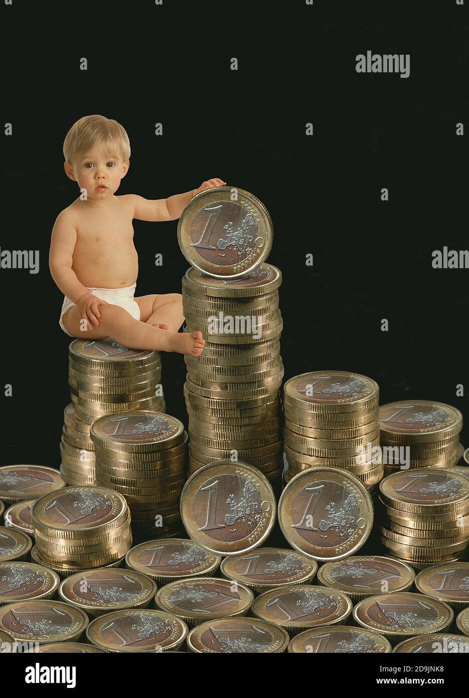GIRL SITTING ON PILE OF EURO COINS, SYMBOLIC IMAGE, HOW TO BUDGET FOR A ...