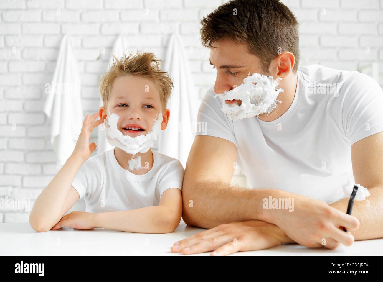 Father and his little son shaving together Stock Photo - Alamy