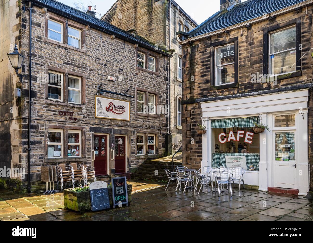 A wider view of Sid's cafe ,Holmfirth, showing Beaties deli next door ...