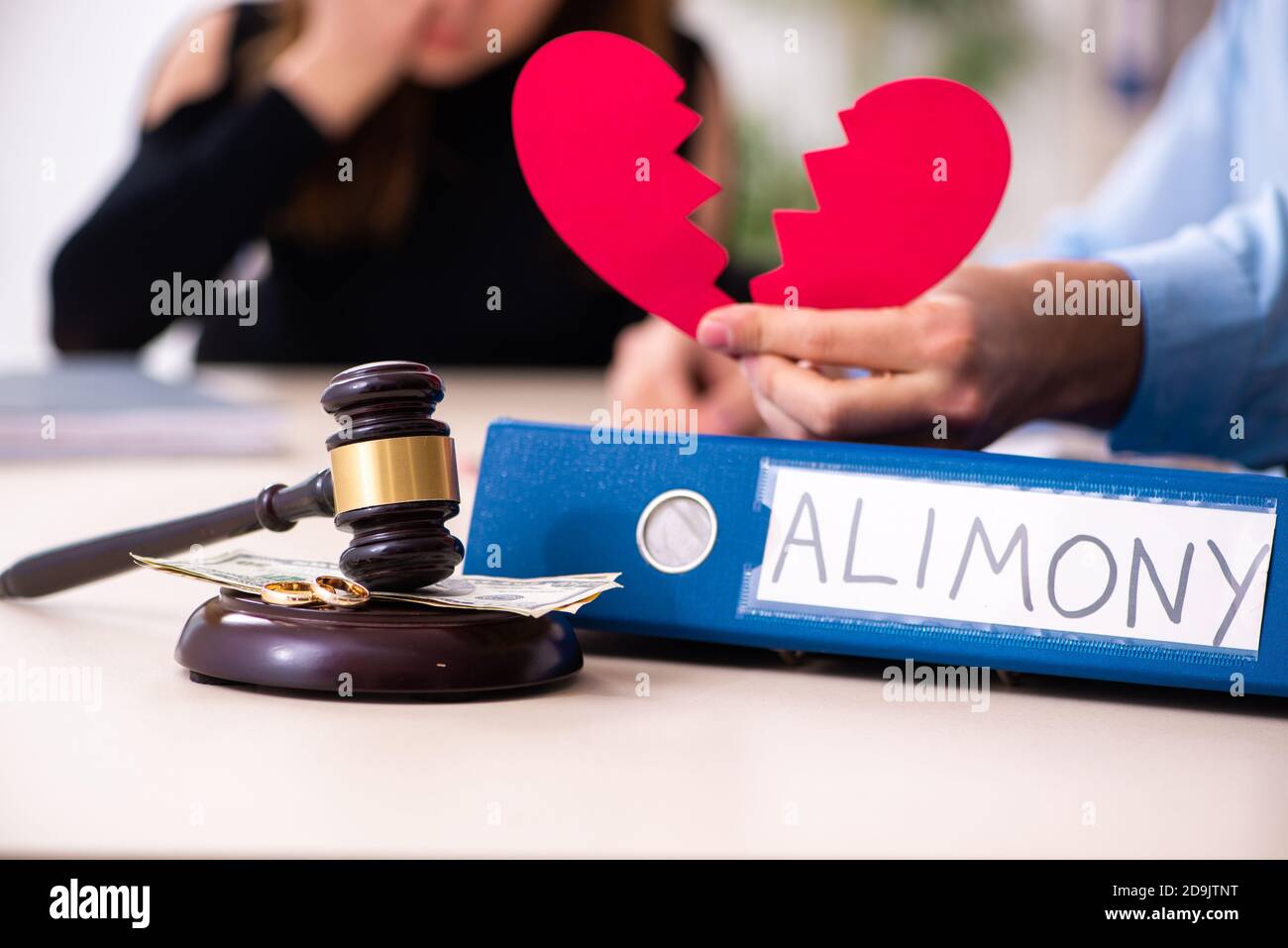 Couple divorcing in alimony concept Stock Photo - Alamy