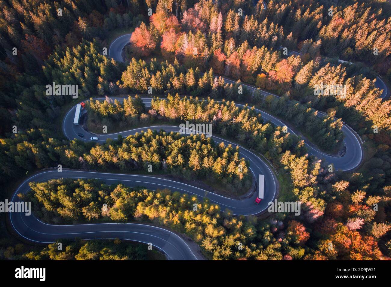 Aerial view of a serpent road at Cheia, Romania, in the heart of ...