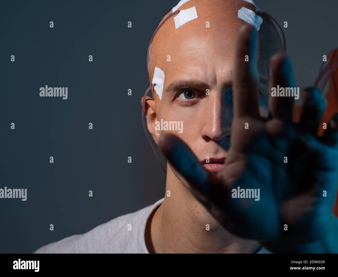Bald man with electrodes in his brain , futuristic concept, cyber punk ...