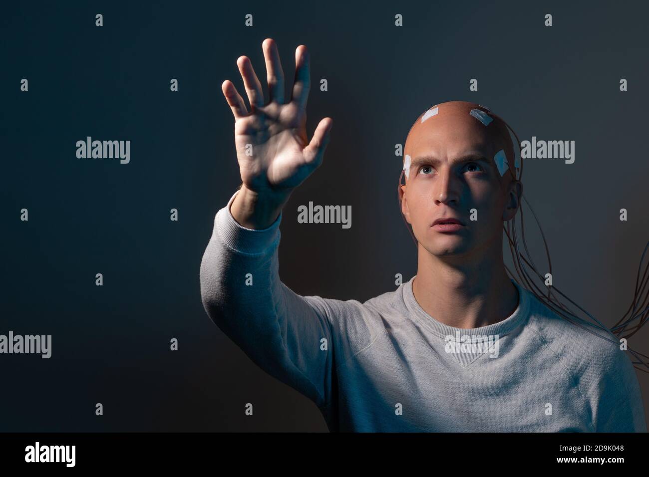 Bald man with electrodes in his brain , futuristic concept, cyber punk ...