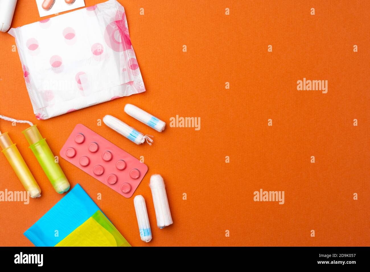 Flat lay of Pads, tampons and pills Stock Photo - Alamy