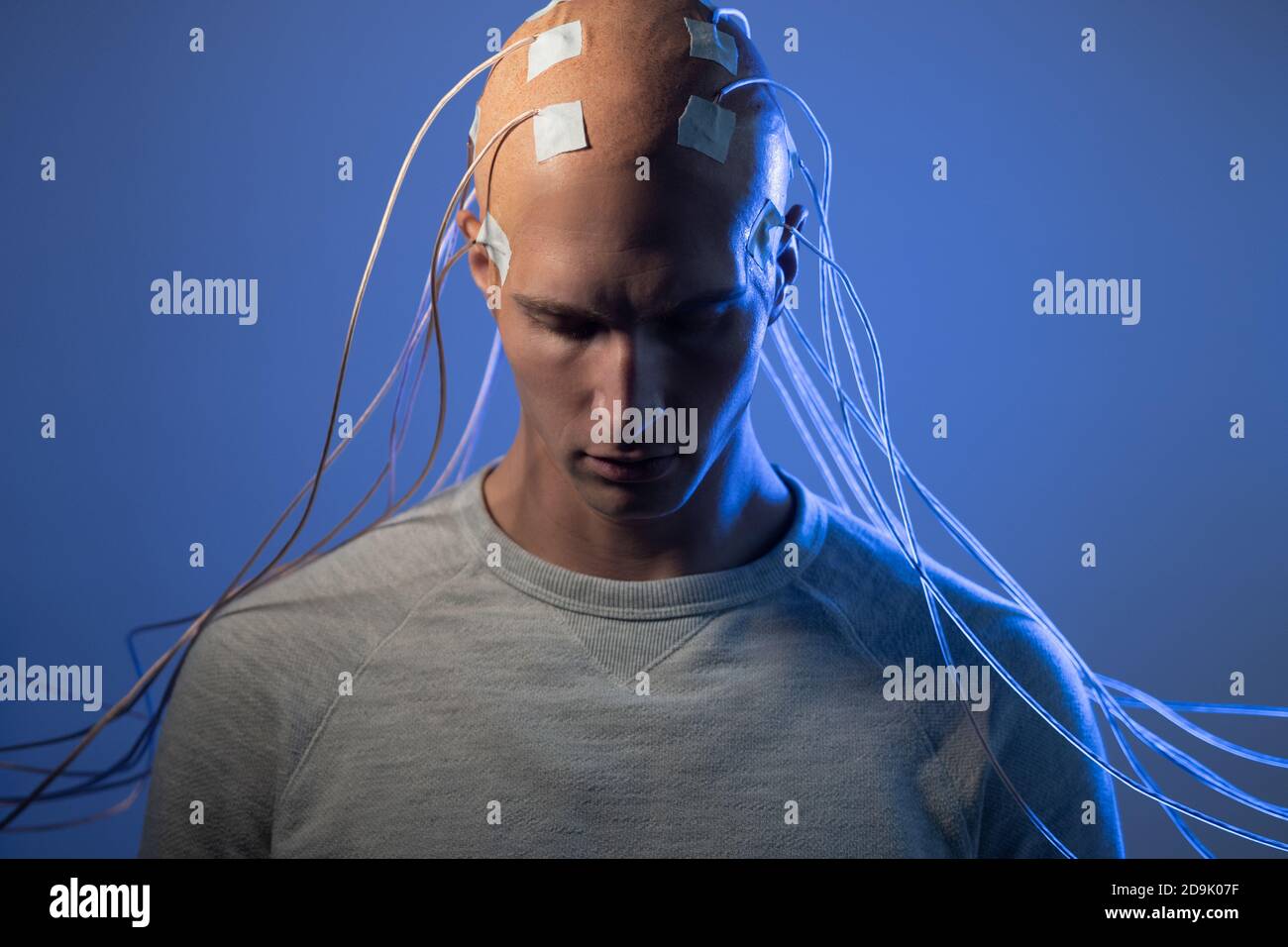 Man with electrodes in his head is a futuristic concept of virtual ...