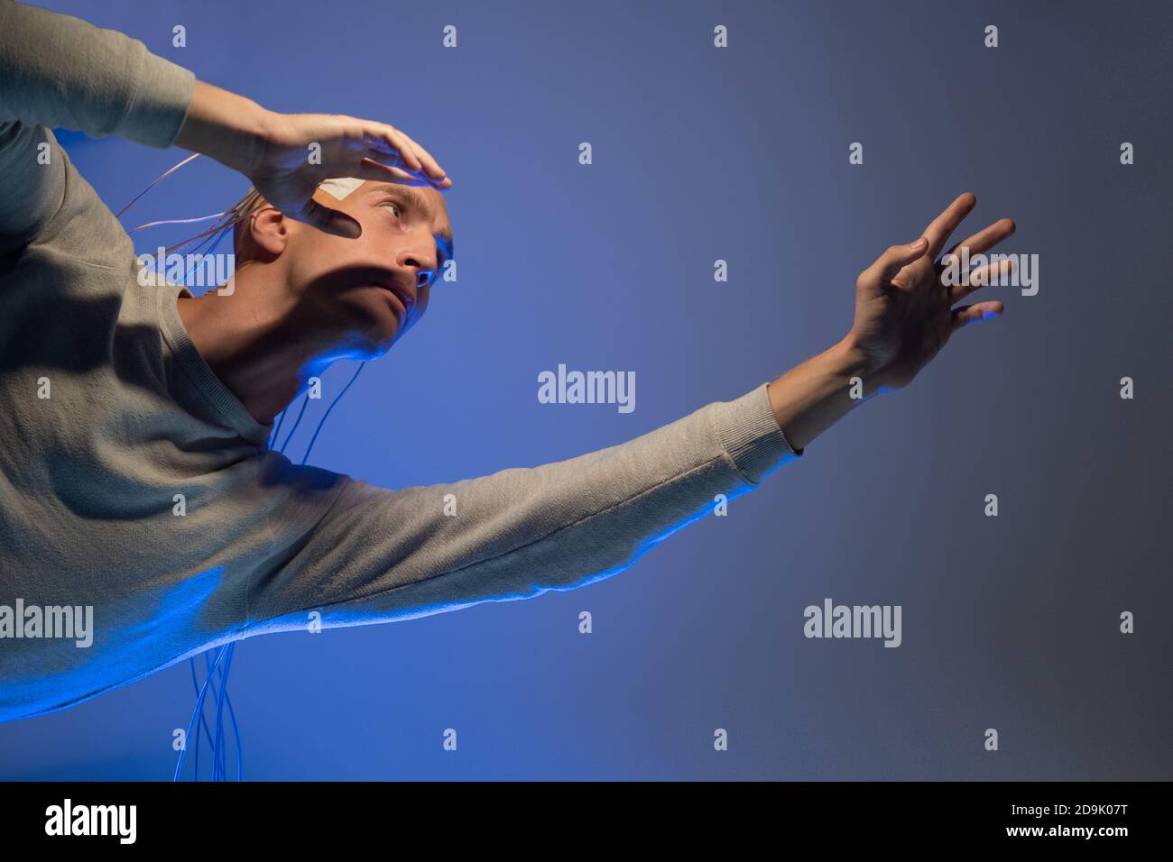 Bald man with electrodes in his brain , futuristic concept, cyber punk ...