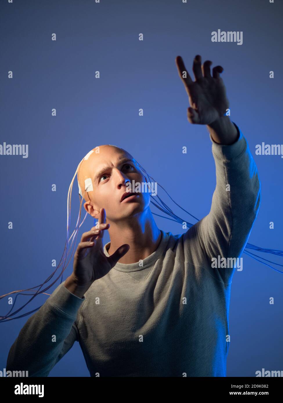 Bald man with electrodes in his brain , futuristic concept, cyber punk ...