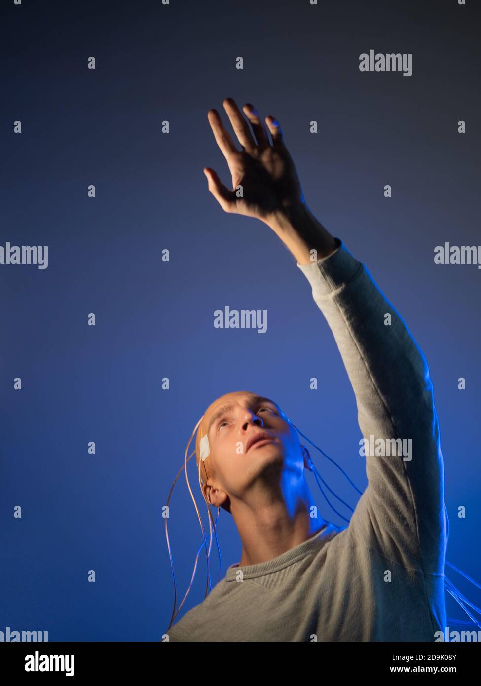 Bald man with electrodes in his brain , futuristic concept, cyber punk ...