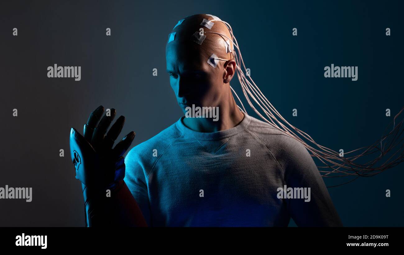 Bald man with electrodes in his brain, a man of the future with ...