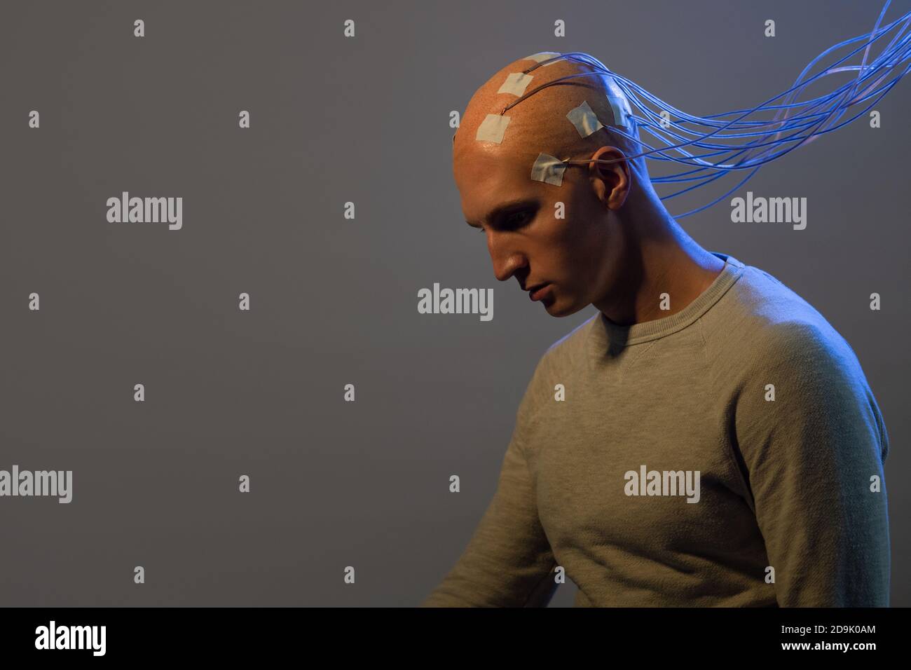 Man with electrodes in his head is a futuristic concept of virtual ...