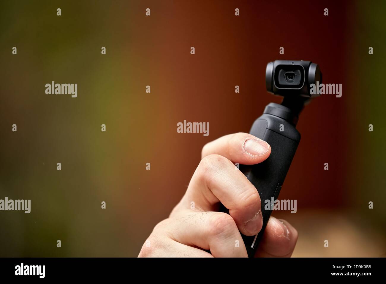 DJI Osmo Pocket gimbal camera in hand. 30.12.18 Bali, Indonesia Stock ...