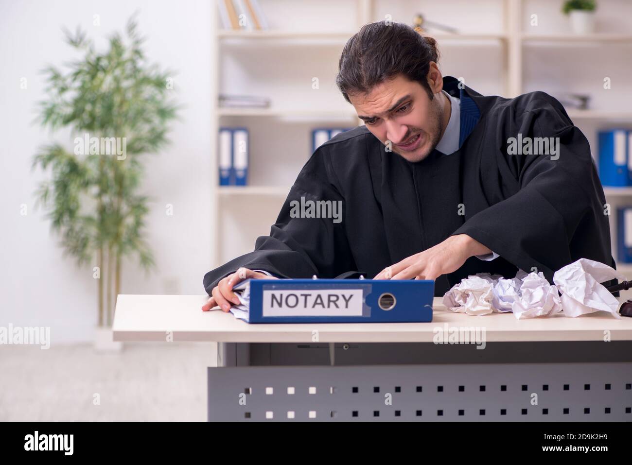 Young judge working in courthouse Stock Photo - Alamy
