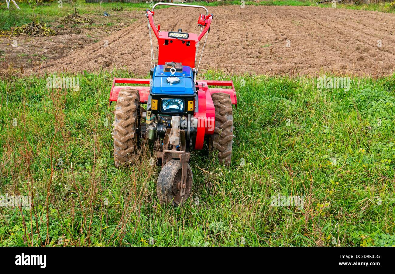 Walk behind tractor hi-res stock photography and images - Alamy
