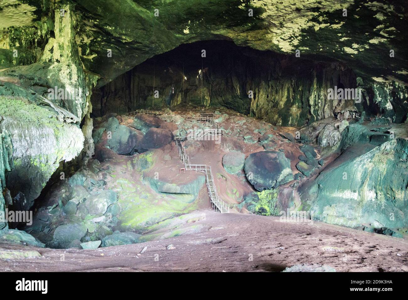 Path inside Great Caves chamber leading to pitch dark chambers Stock ...