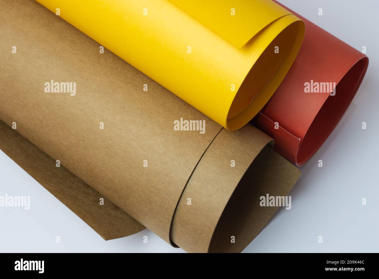 Colorful rolled textured art paper isolated on white background Stock ...