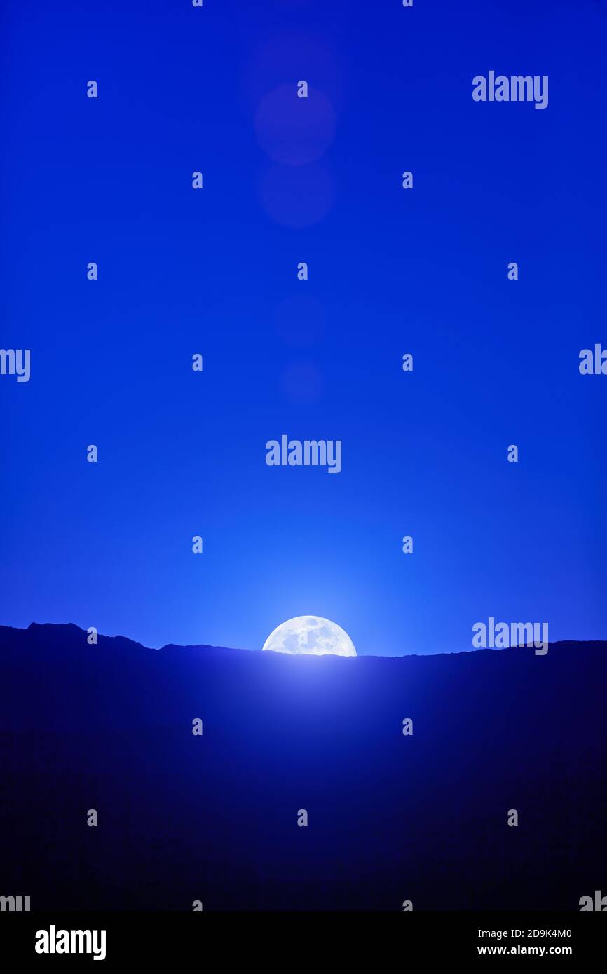 Beautiful Full Moon over the mountains. Moonrise in the mountains ...