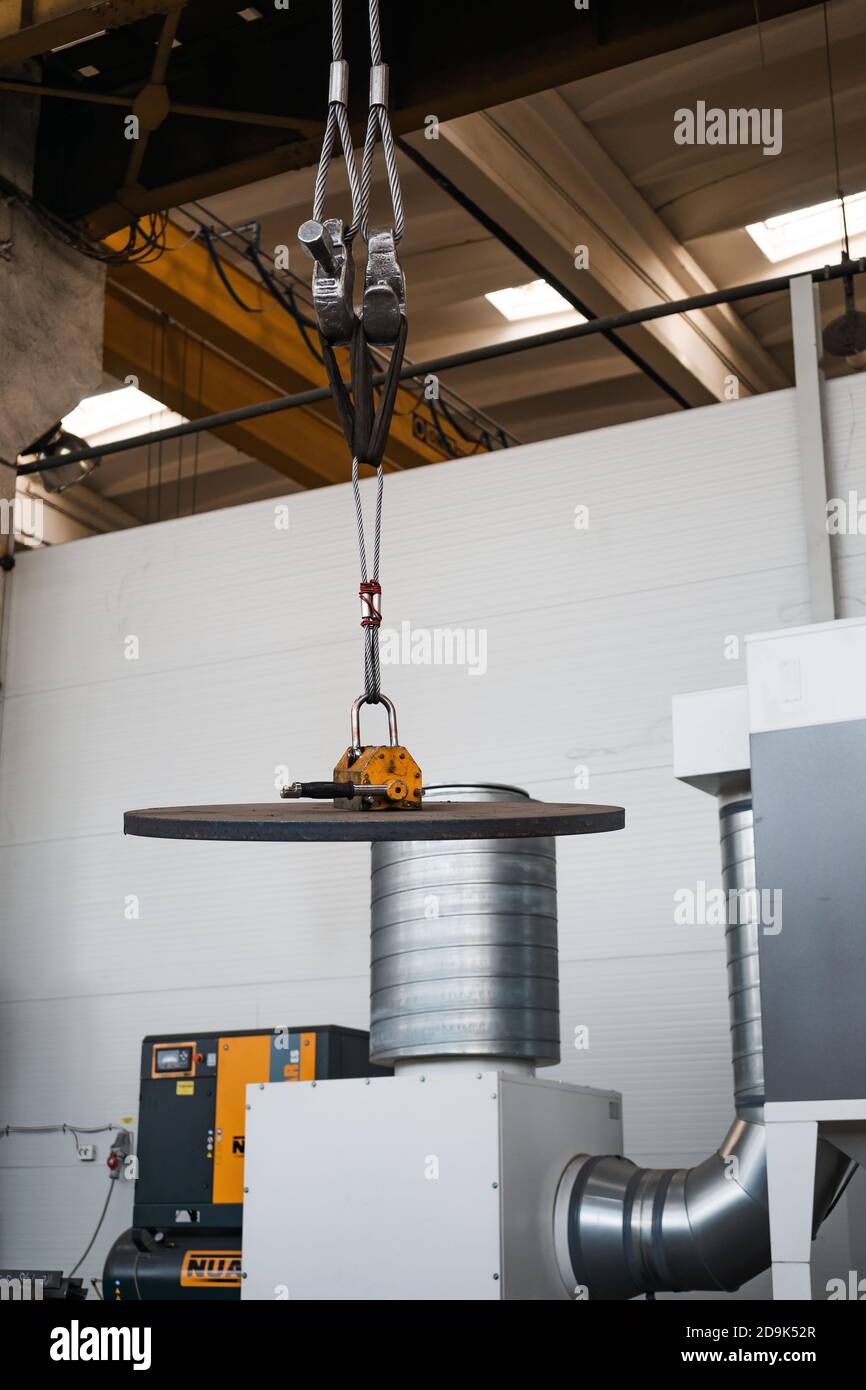 Vertical shot of lifting equipment in a factory Stock Photo - Alamy