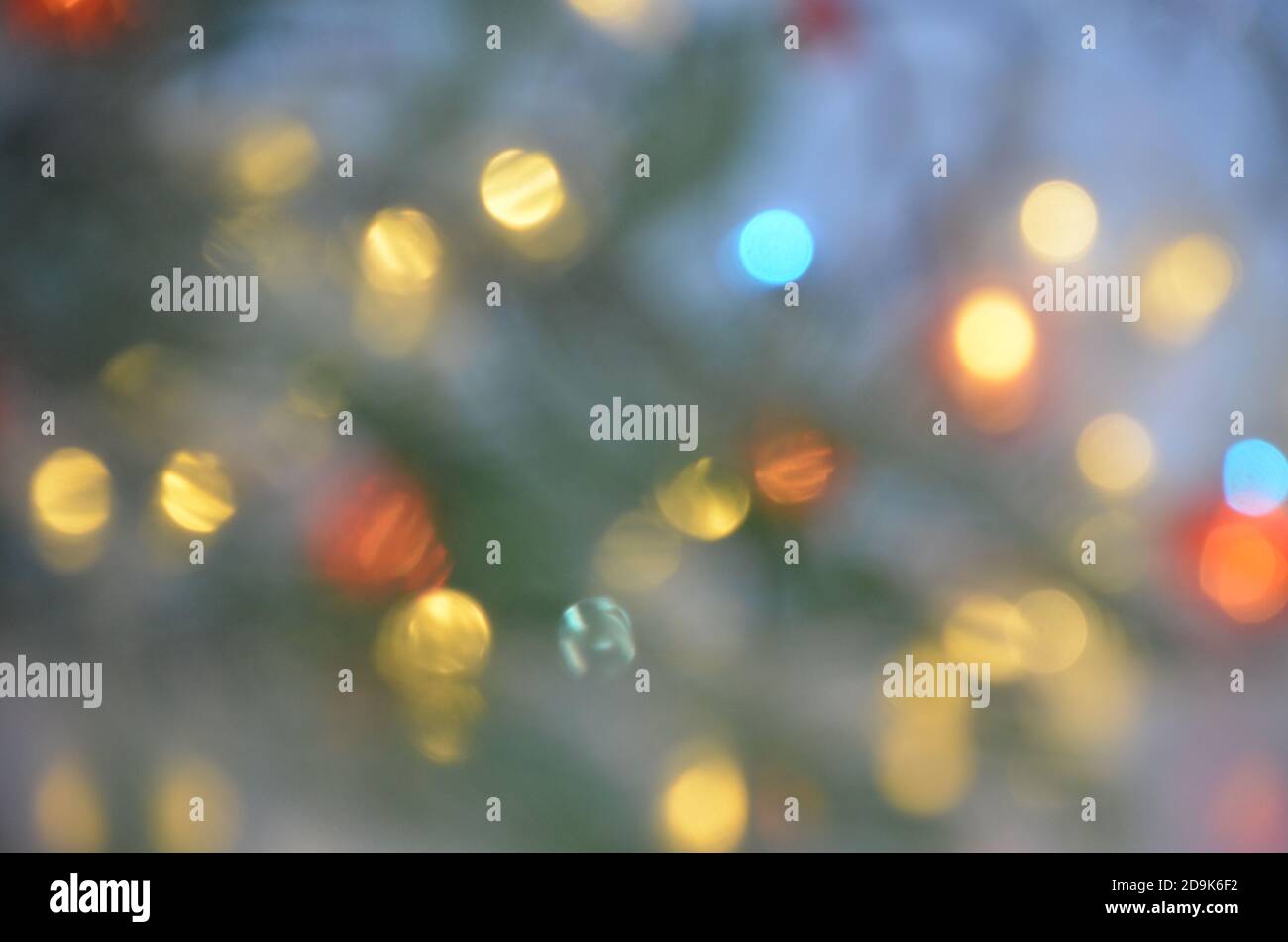Red yellow blue and orange holiday bokeh. Abstract Christmas background ...