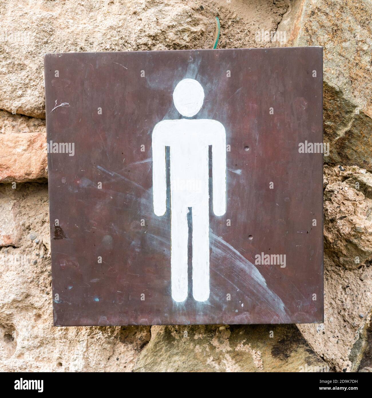 Closeup shot of men's toilet sign Stock Photo - Alamy