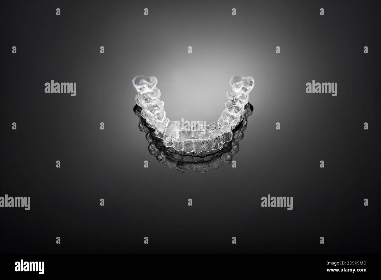 Invisible orthodontics cosmetic brackets on gradient background, tooth ...