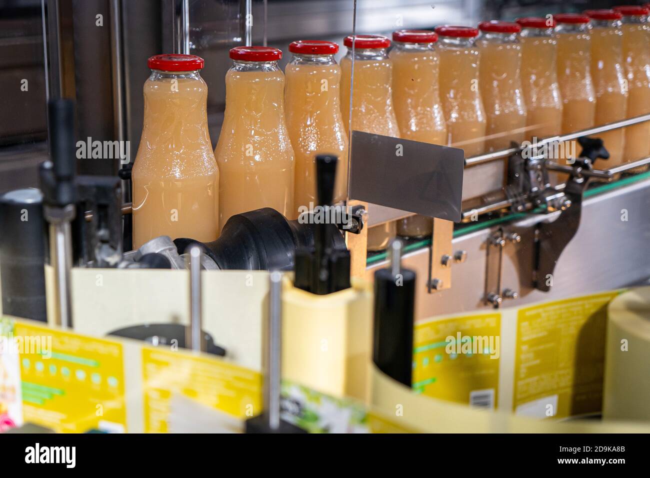 Juice making, factory line production, industry juice cans packaging ...