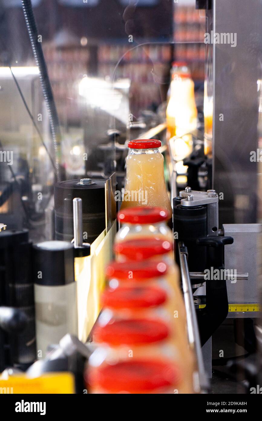 Juice making, factory line production, industry juice cans packaging ...