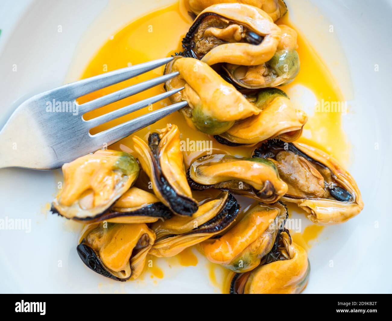 Closeup shot of tasty pickled mussels on a plate Stock Photo - Alamy